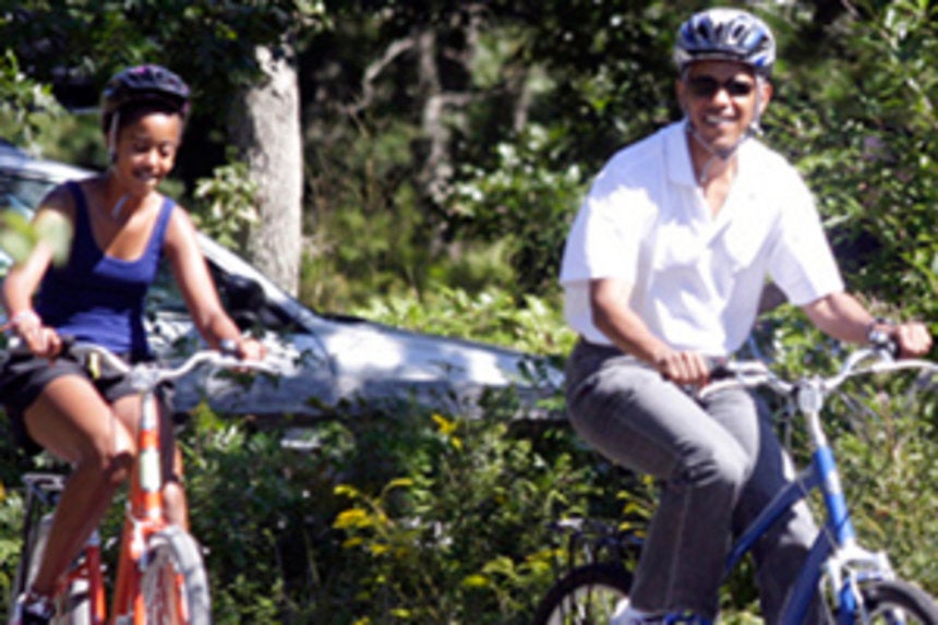 Obama Watch: Pres. Obama and Malia's Bike Ride - Essence