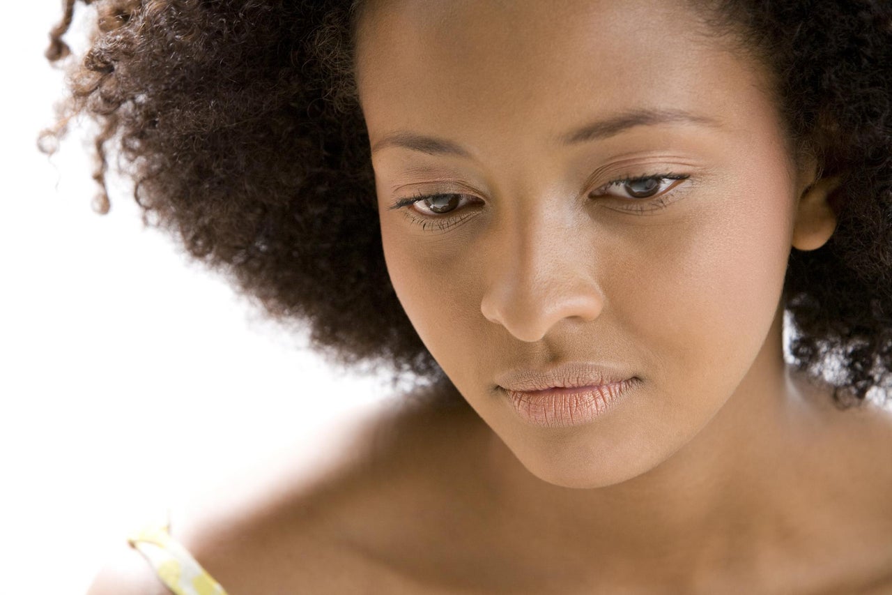 Free Debbie Downer! Why Are We So Afraid of Sadness? | Essence