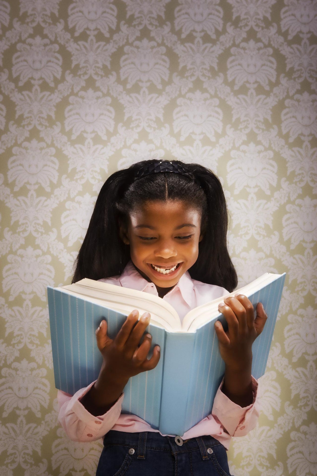 Brown Girl Bookshelf: 10 Books to Read to Our Daughters - Essence | Essence