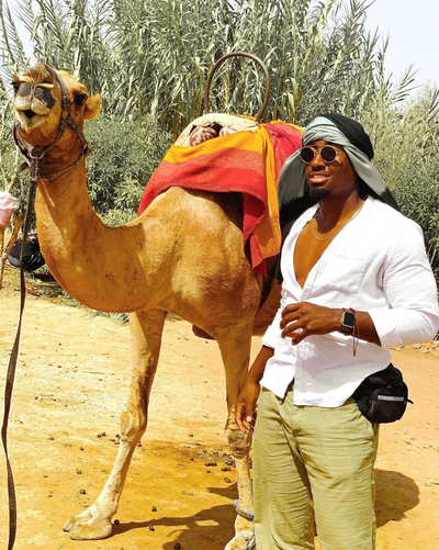 10 Photos Of Traveling Black Men To Make Your Holidays Bright - Essence