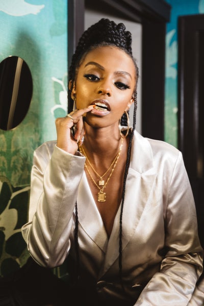 OHSO Talks Sneakers, Gold Fronts And Her Favorite Vintage Jacket | Essence