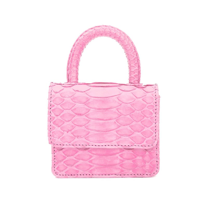 Lizzo Finally Reveals What She Carries In Her Tiny Bag - Essence