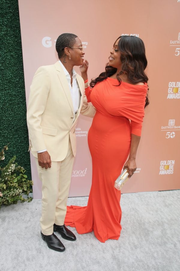 24 Photos Of Niecy And Jessica Betts Packing On The PDA | Essence