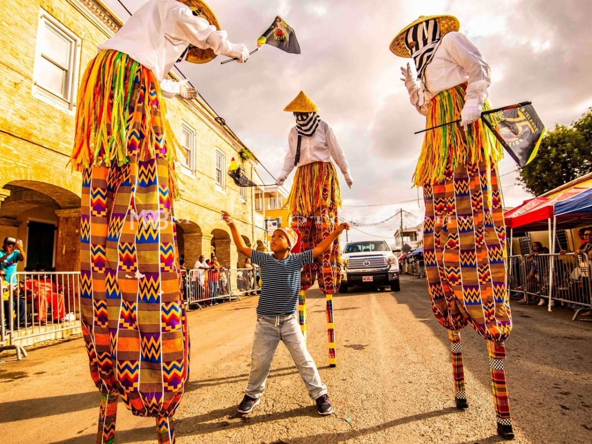 How Moko Jumbies Keep African Traditions Alive In The Caribbean | Essence